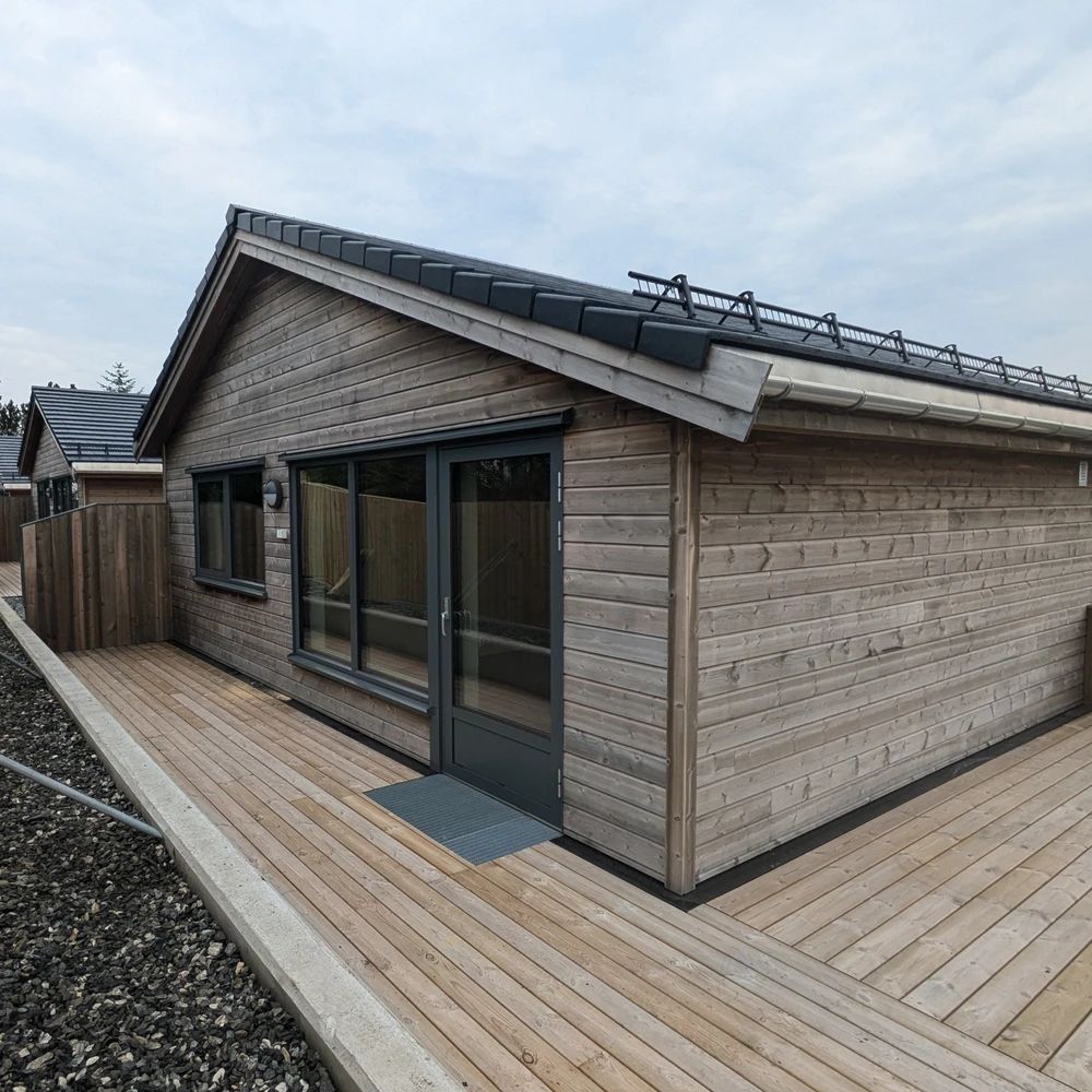 Jernvitrolkledning i malmfuru - vedlikeholdsfri behandling - Skjåk Trelast